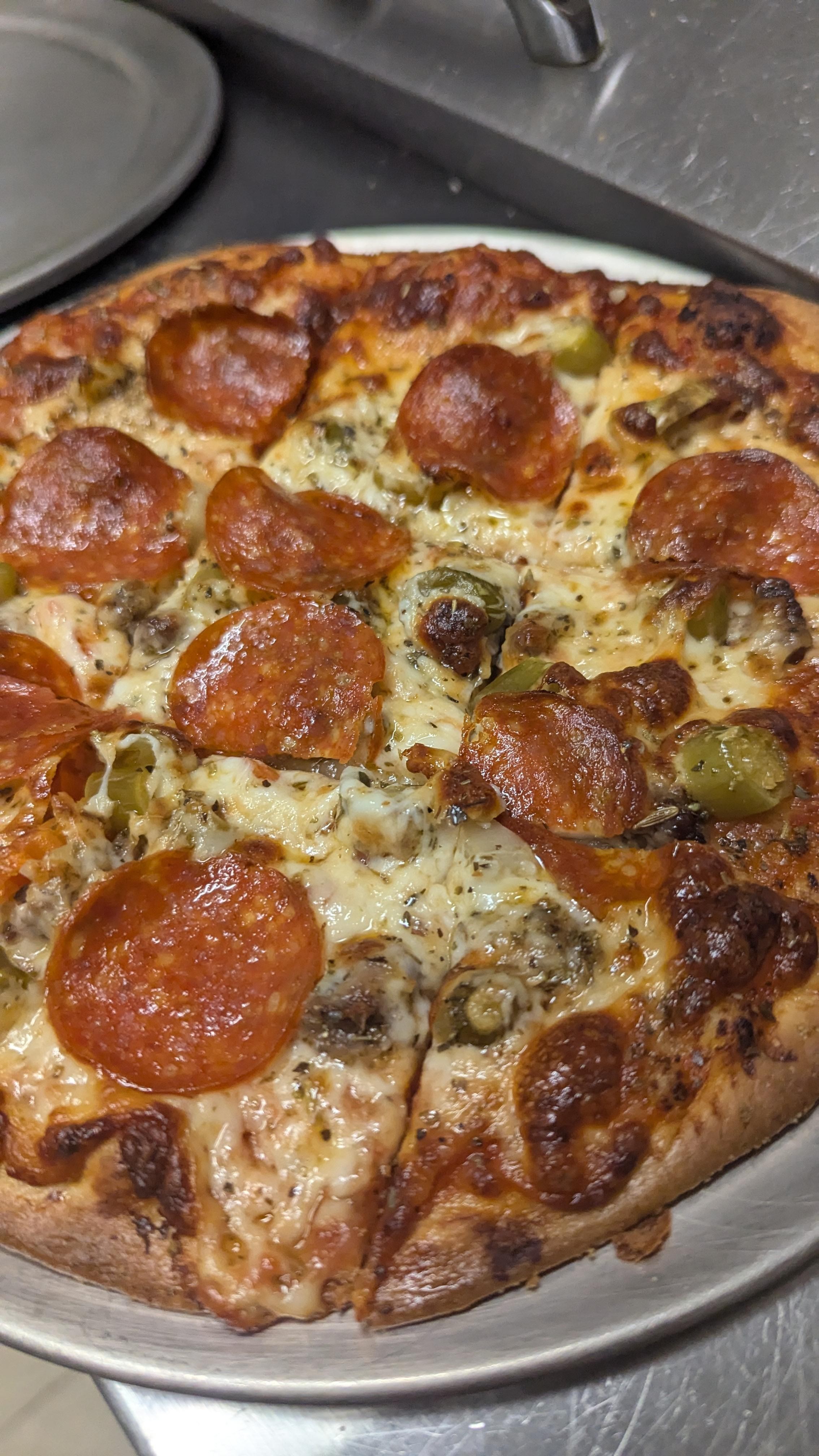 2007 Kramer Lane unit 105 - 10" Thin Crust Pizza