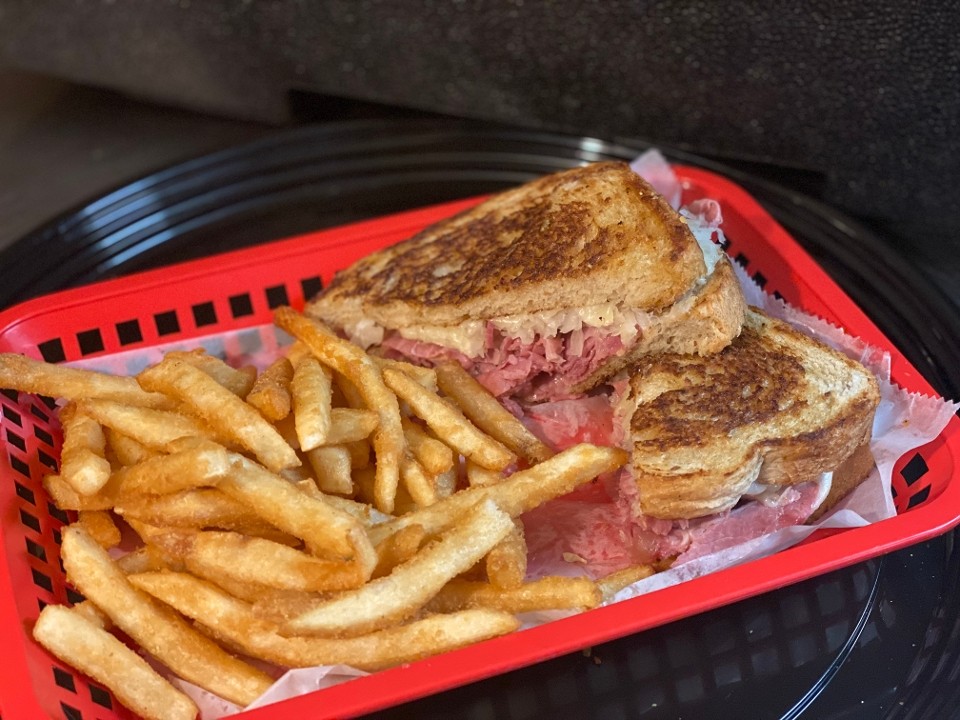 The Bread Basket Deli - Grilled Reuben
